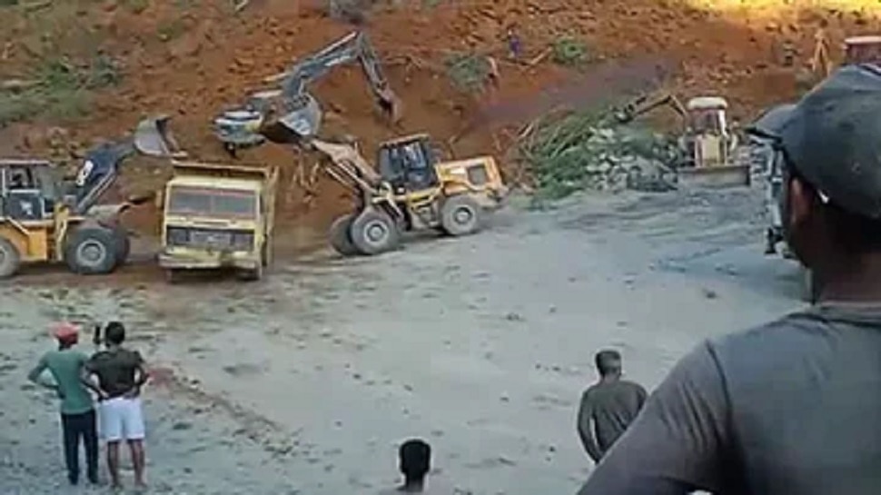 More than 15 people are suspected to be trapped in the stone quarry ...