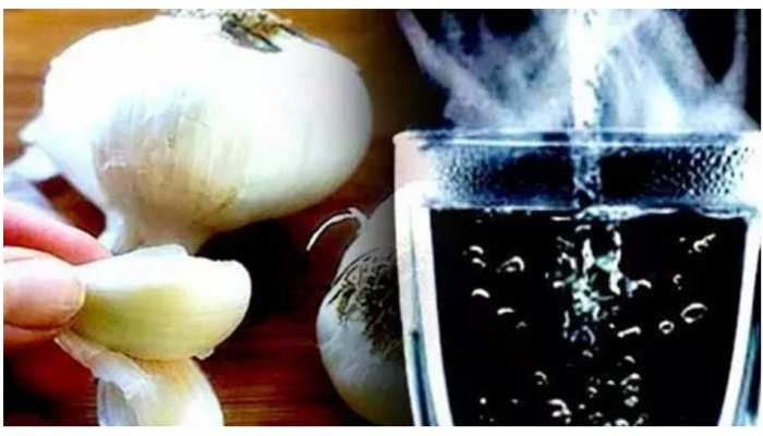 Luke warm water with raw garlic health benefits Garlic Water Benefits ...