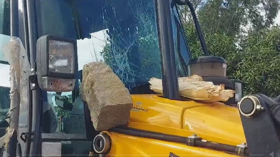Stone pelting during forest land encroachment clearance operation ...