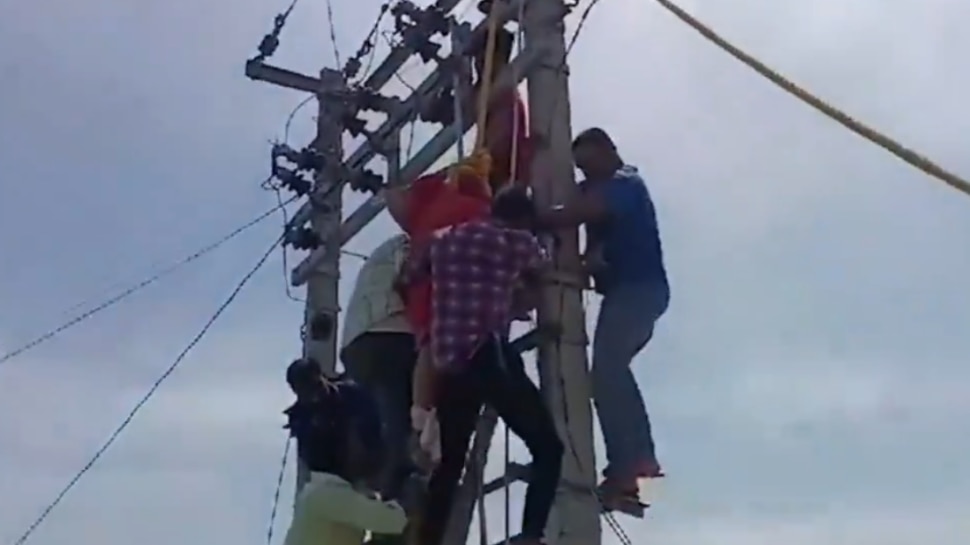 viral video wife climbs electricity poll demanding husband to keep ...