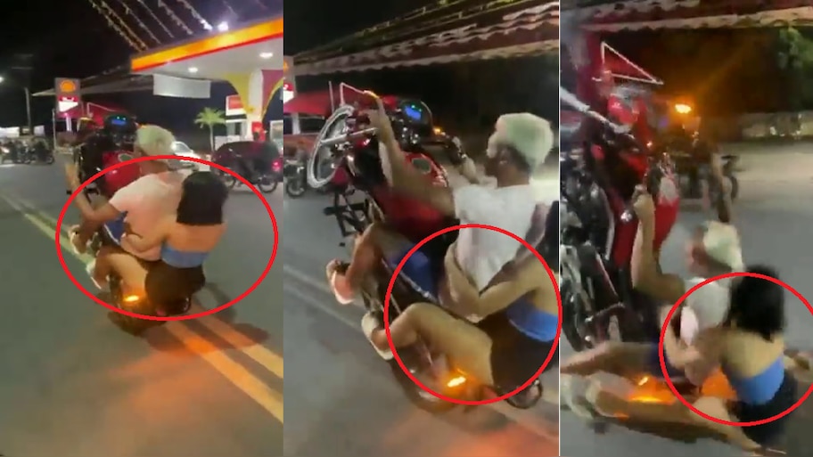 Viral Video: Couple falls off bike while performing dangerous stunts ...